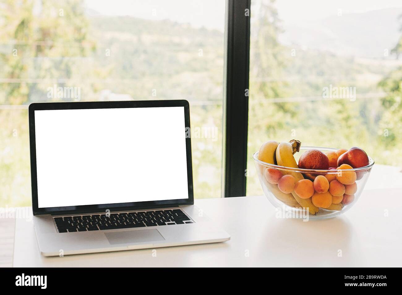 Cooking home concept. Food blog. Laptop with blank white screen and ...