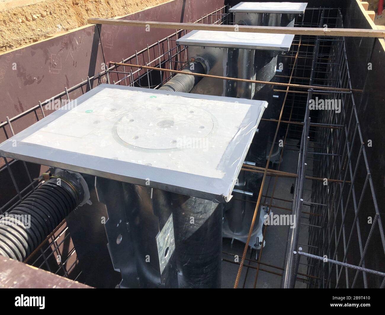 Formwork and reinforcement of road bollard foundation Stock Photo - Alamy