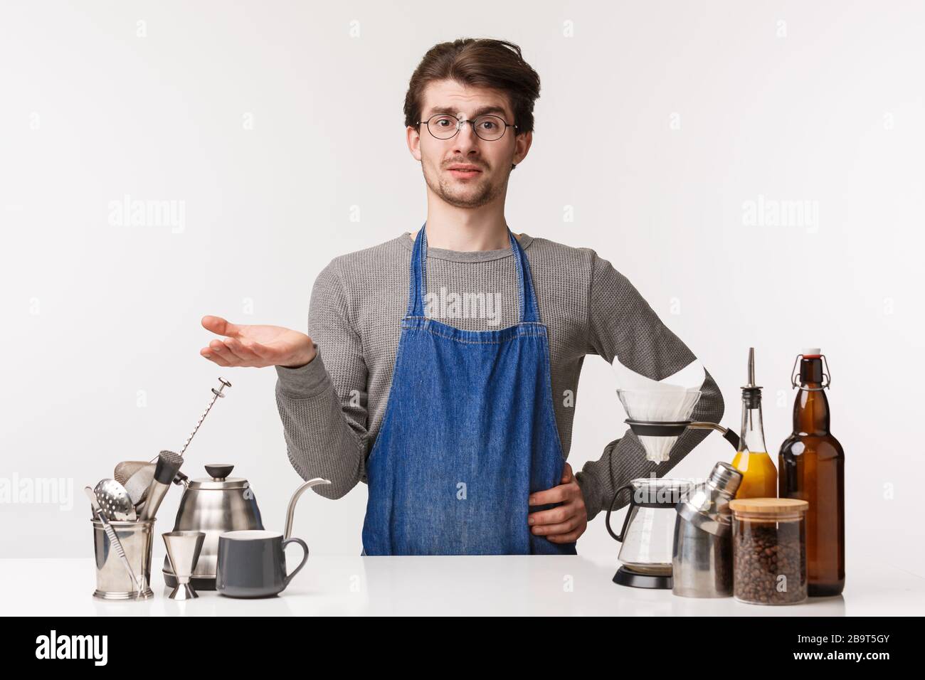 Barista, cafe worker and bartender concept. Portrait of confused and ...