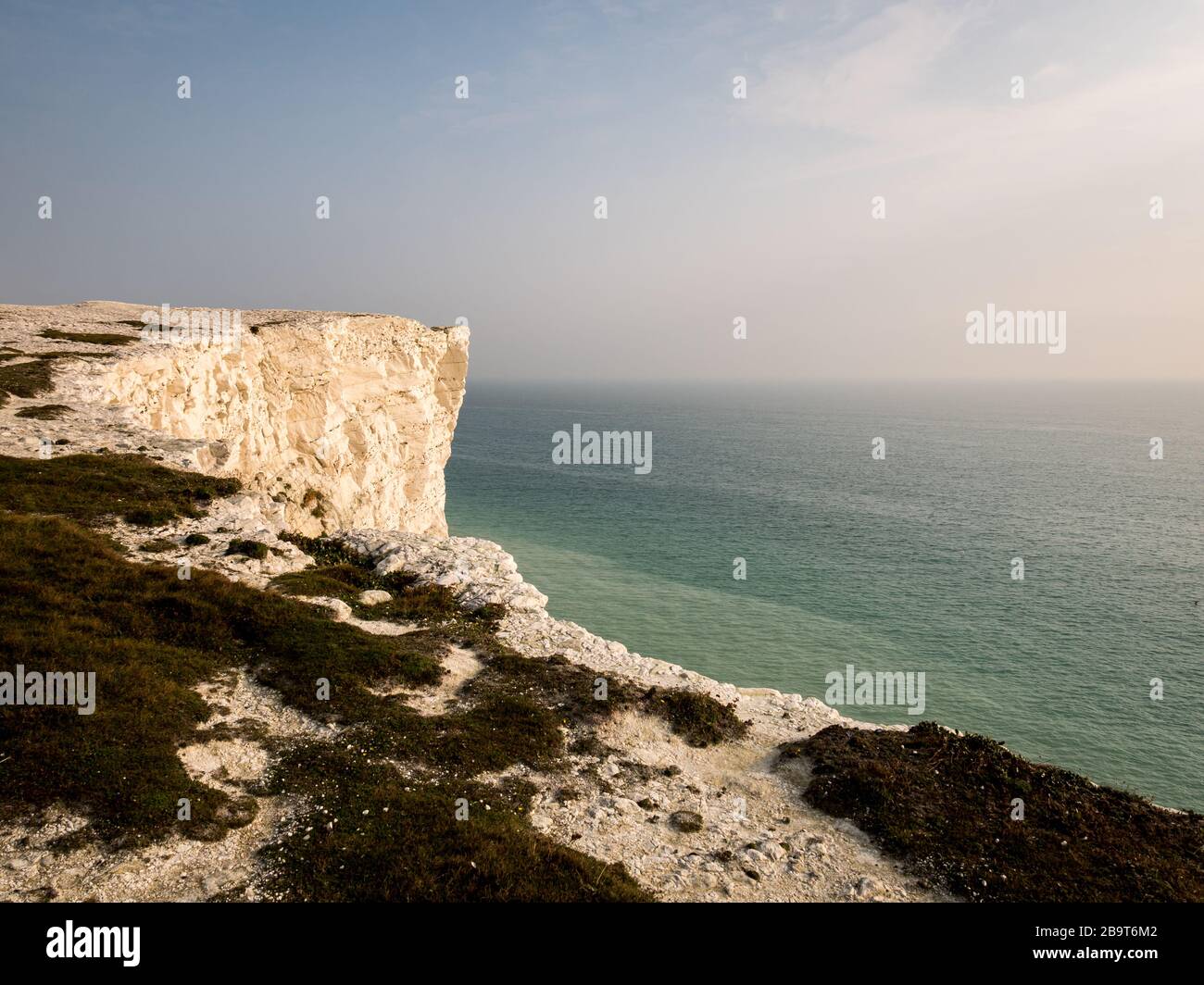 Chalk cliffs of the South Downs, East Sussex, England. A dusk view ...