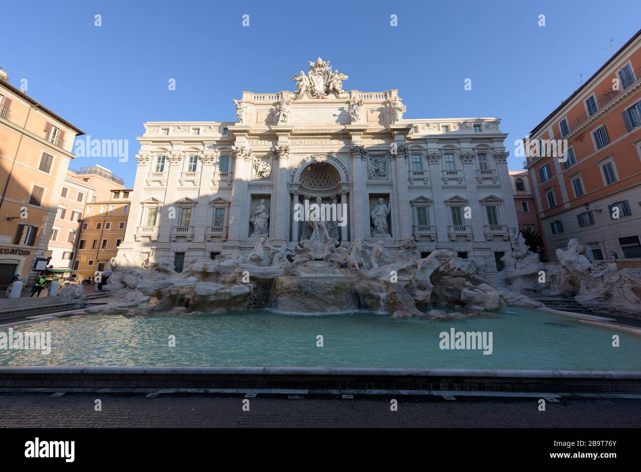 ROME, ITALY - 10 March 2020: A police person stands next to the Trevi ...