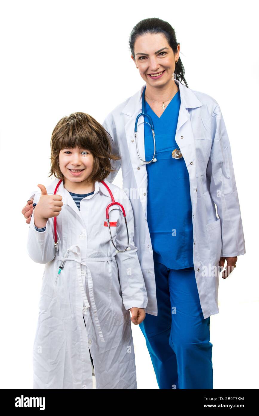 Happy doctor and student boy giving thumb up isolated on white ...