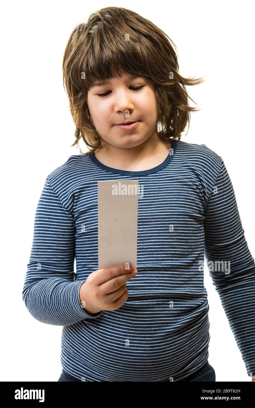 Boy holding and reading a bookmark isolated on white background Stock ...