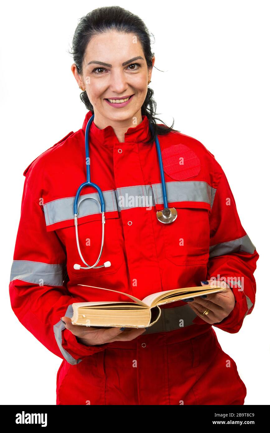 Emergency doctor reading a book isolated on white background Stock ...