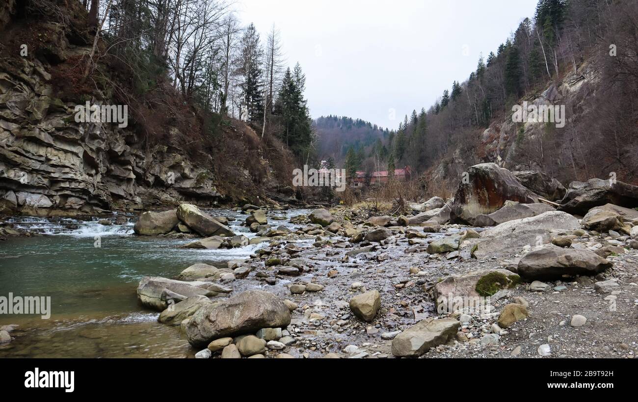 Landscape of a mountain river in the forest in early autumn and late ...