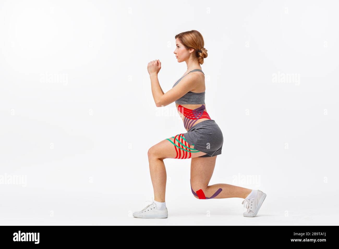 Kinesiology taping. Kinesiology tape on patient knee,hip, should Stock ...