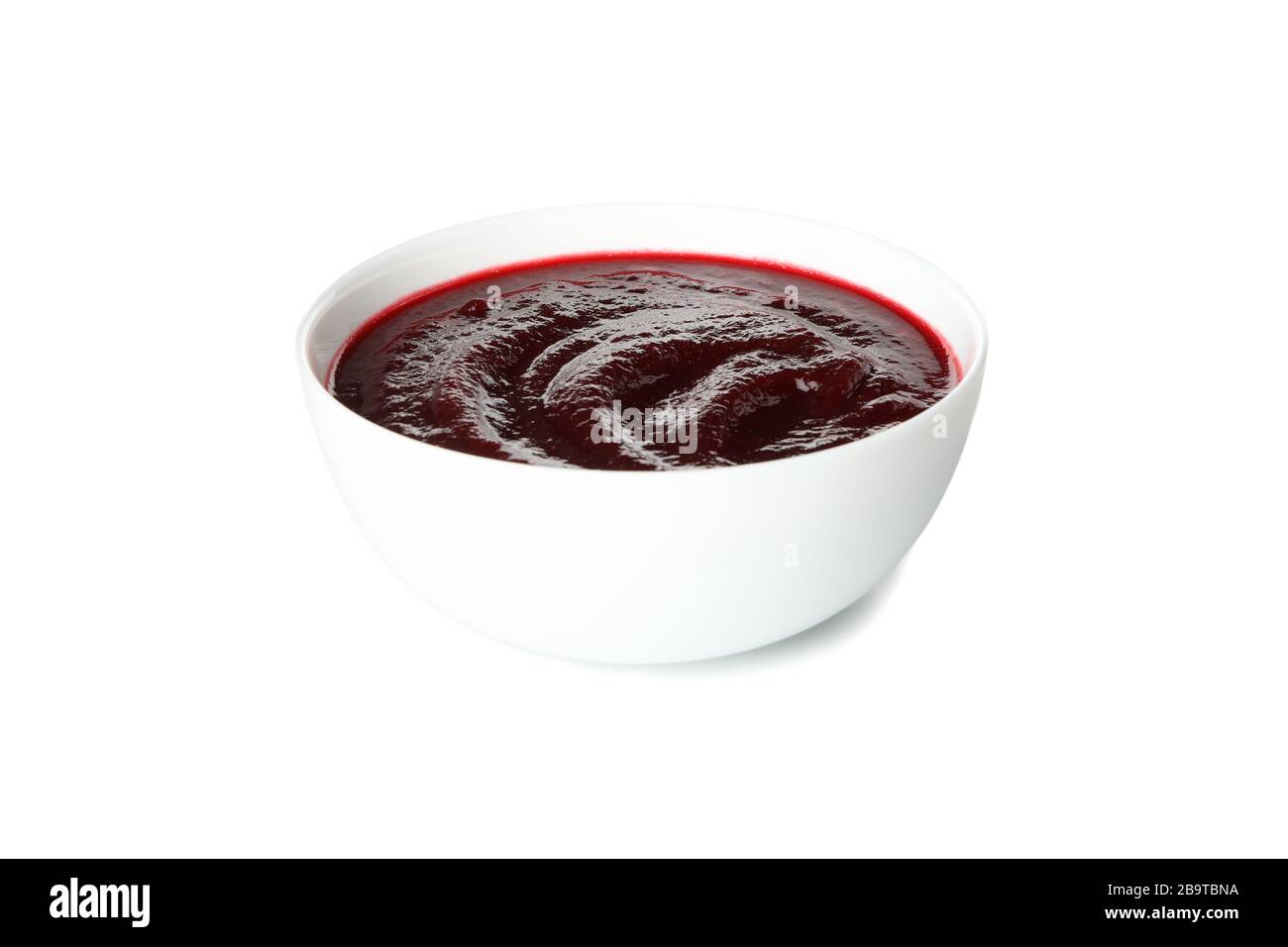 Beet cream soup isolated on white background Stock Photo - Alamy