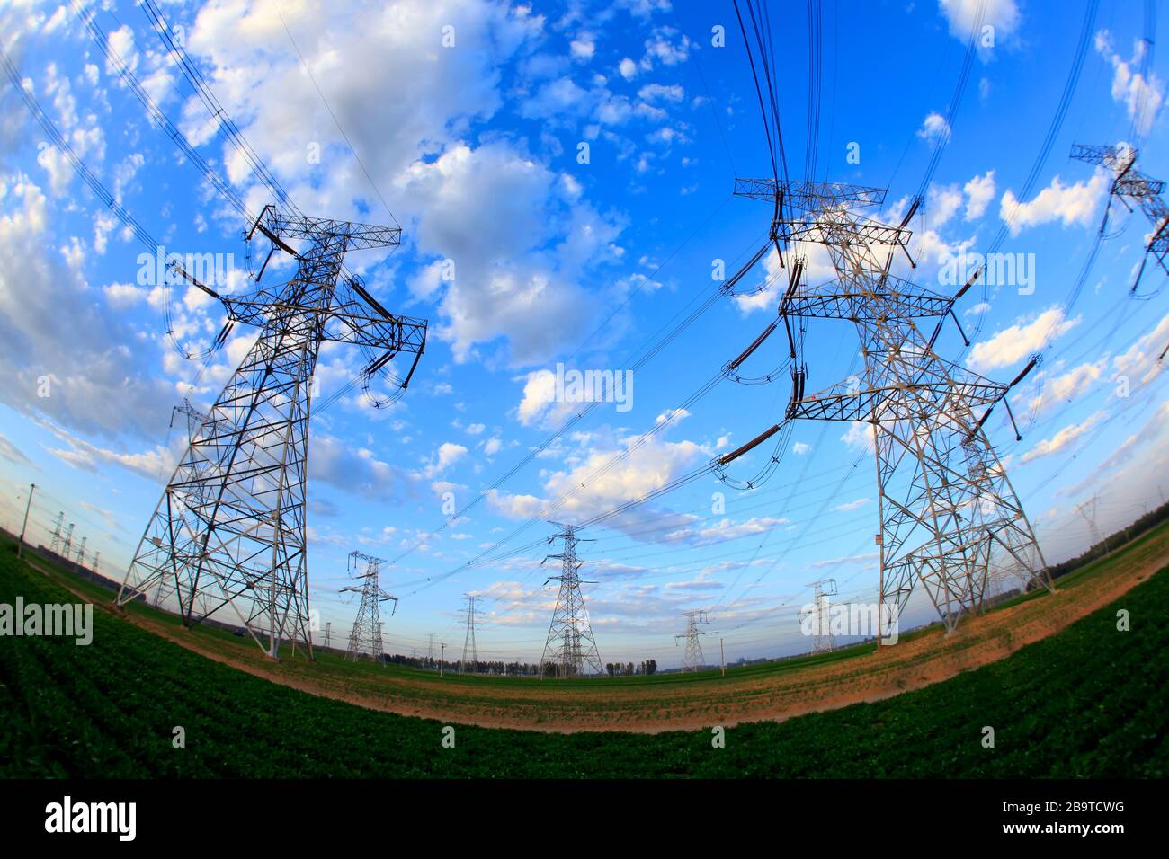 Pylon, the pylon under the blue sky white clouds Stock Photo - Alamy
