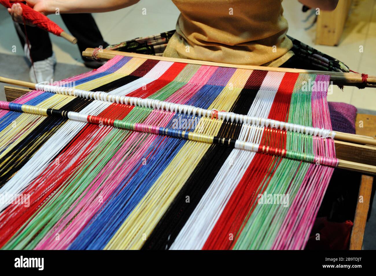 Old fashioned textile production. manual Manufacturing fabric Stock ...
