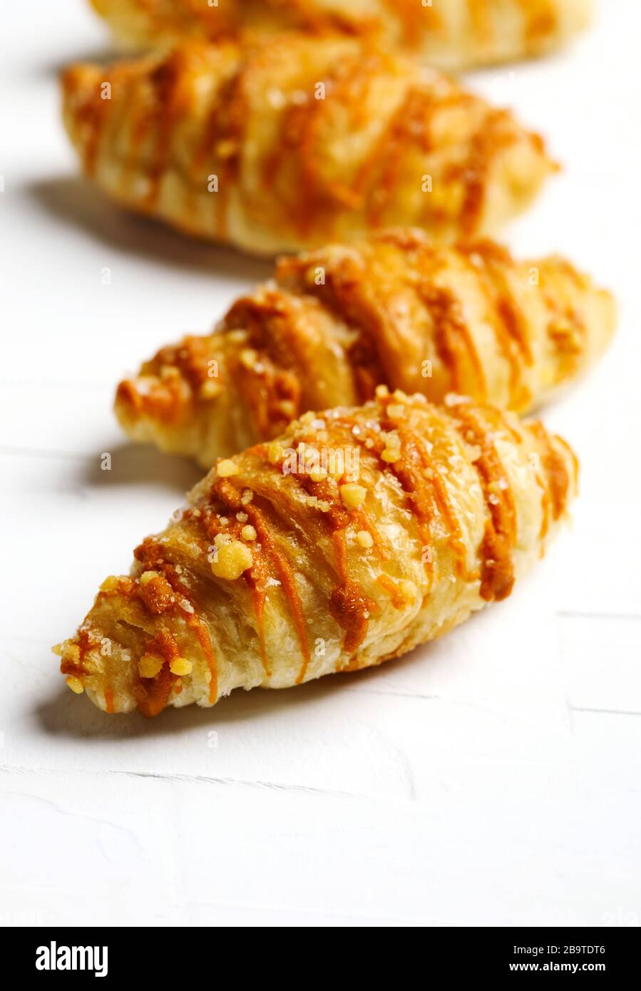 Salted caramel croissants. Topped with a caramel drizzle and a sweet ...