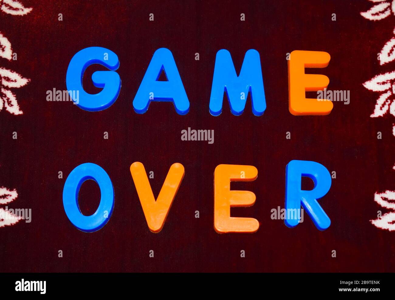 Game over word written with different colored letter blocks arranged on ...