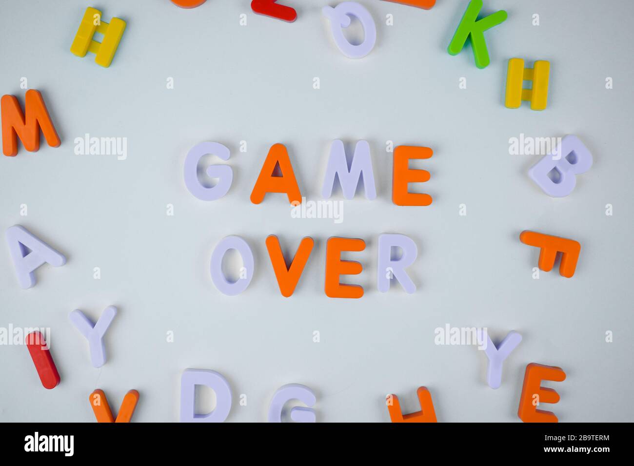 Game over word written with different colored letter blocks arranged on ...