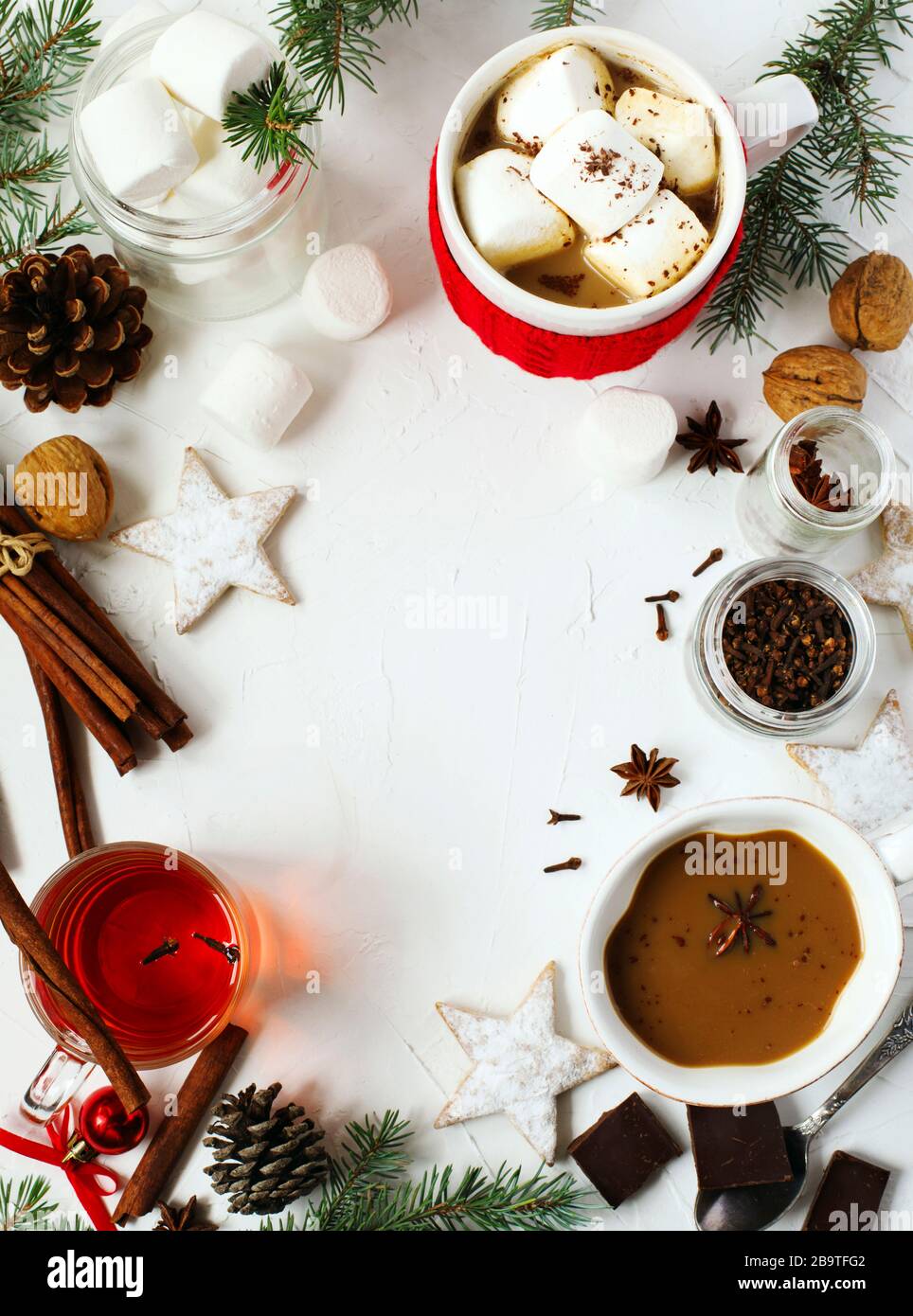 Hot chocolate with spicy, marshmallows and spicy tea, frame, top view ...