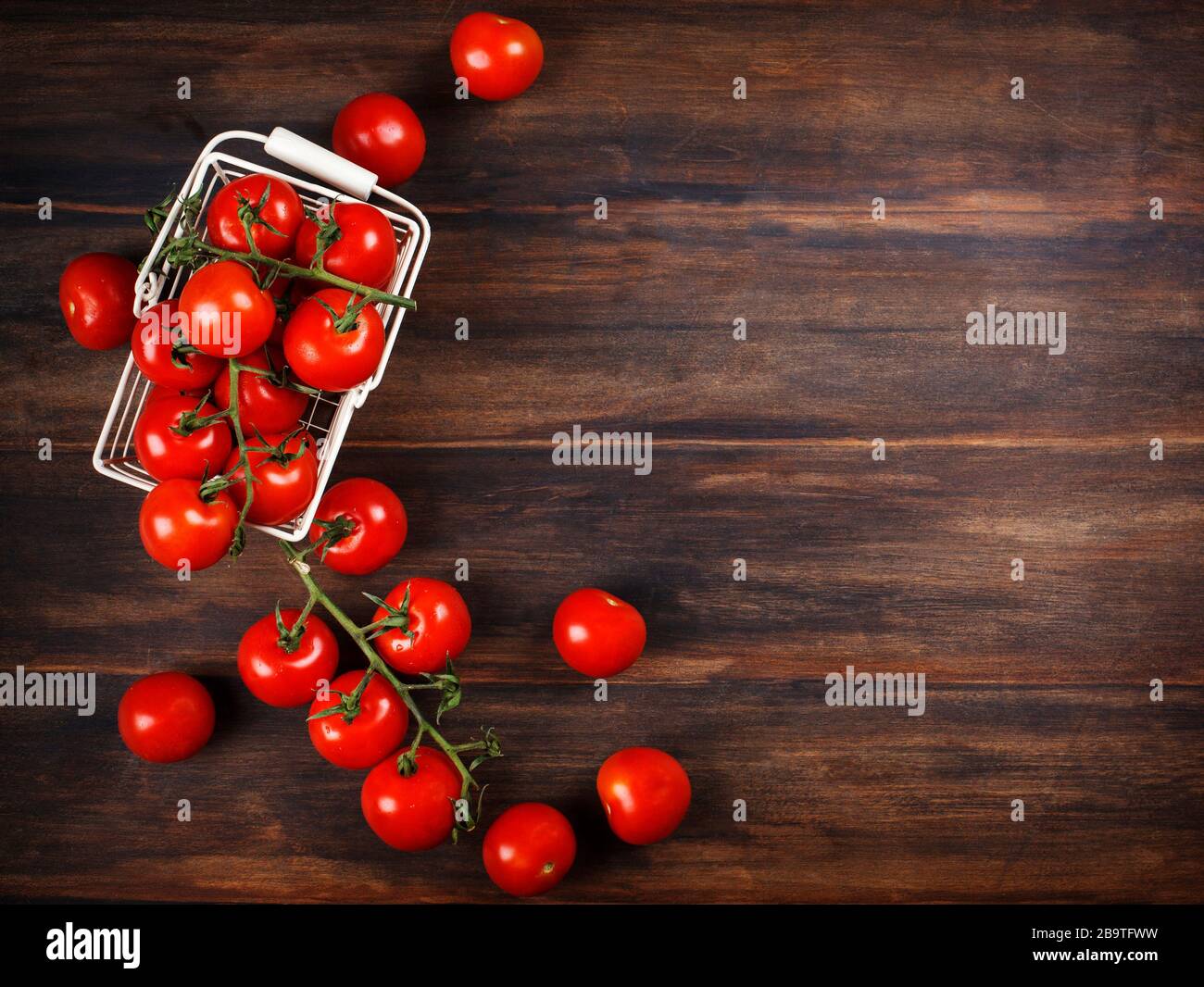 Fresh tomatoes on wooden background, copy space Stock Photo - Alamy
