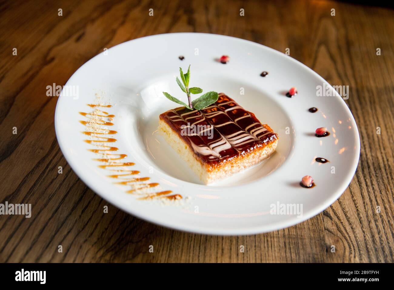 Fresh Tres Leches cake on the plate Stock Photo - Alamy