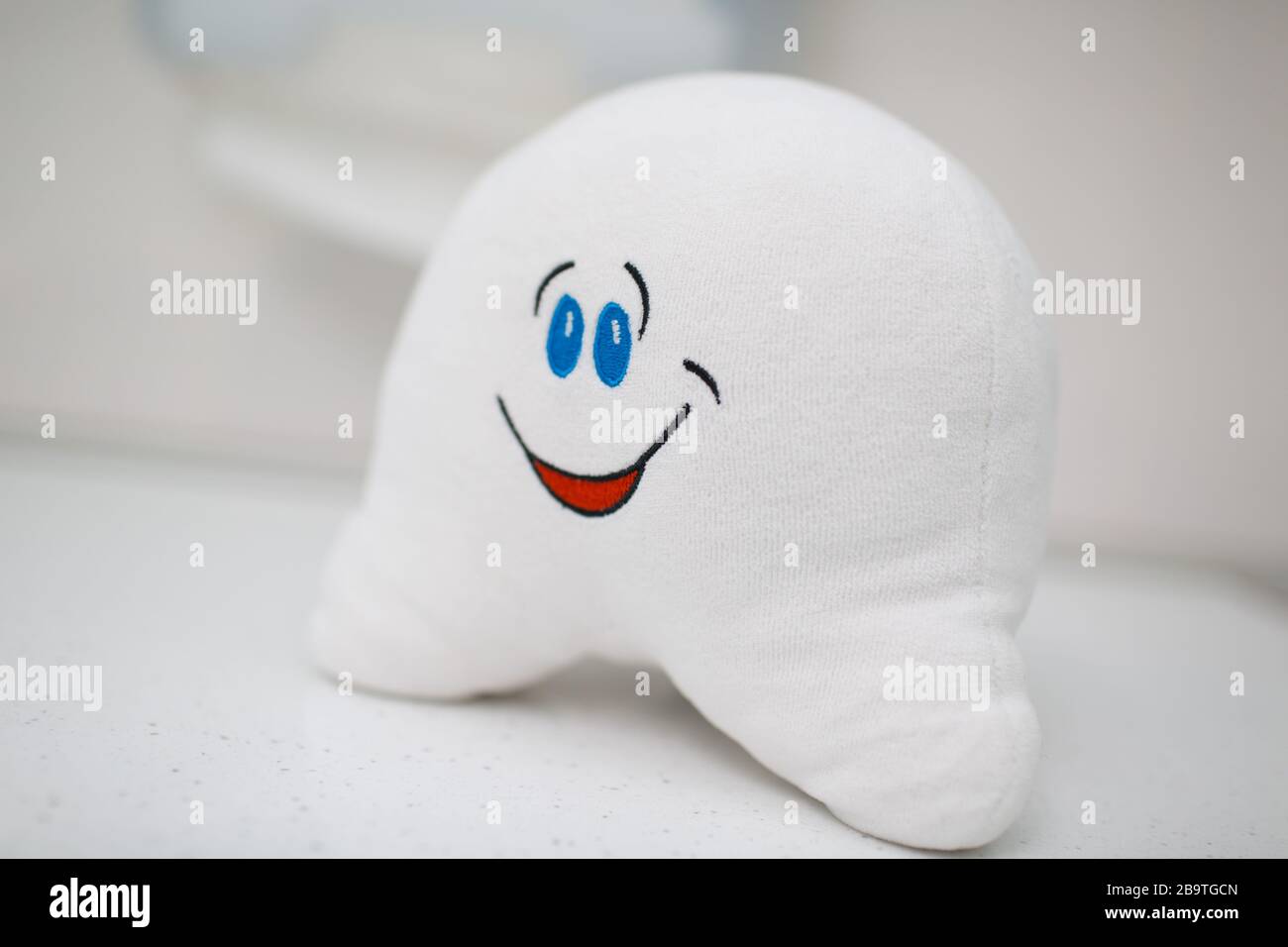 Soft tooth toy in a dental clinic Stock Photo - Alamy