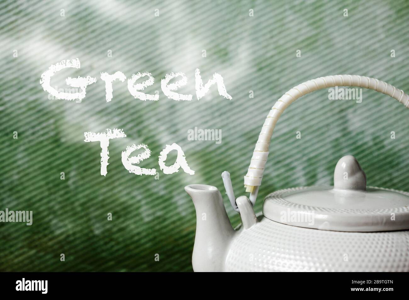 Chinese teapot with text Green Tea Stock Photo - Alamy