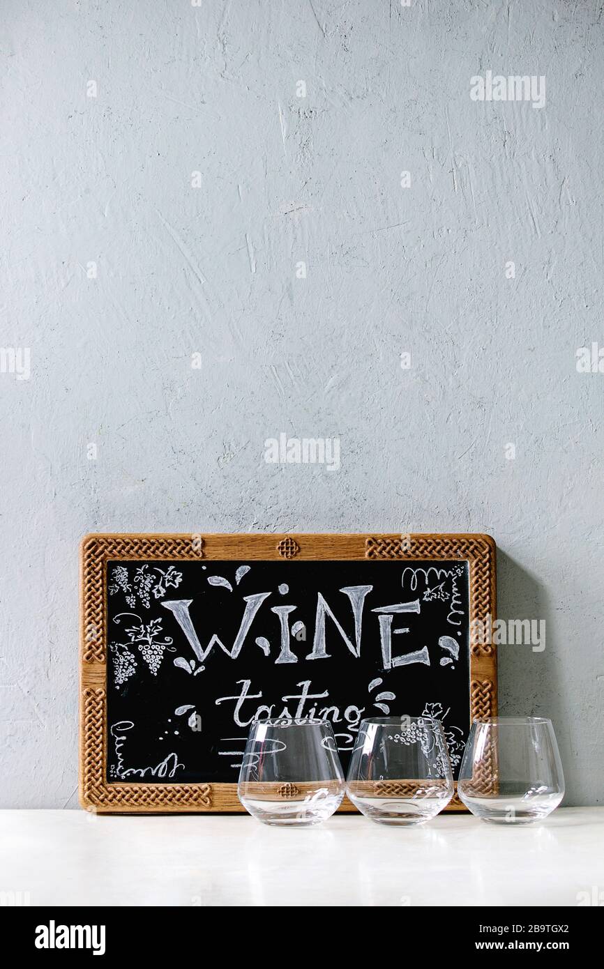 Wine tasting concept. Three empty old fashion wine glasses and ...