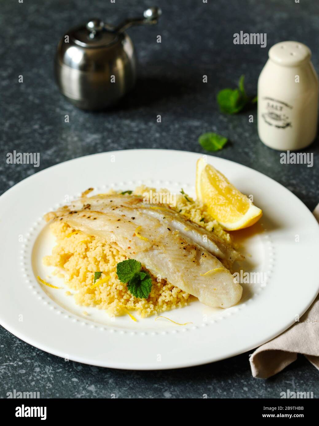 Fried Basa Fillet with Lemon Couscous Stock Photo - Alamy