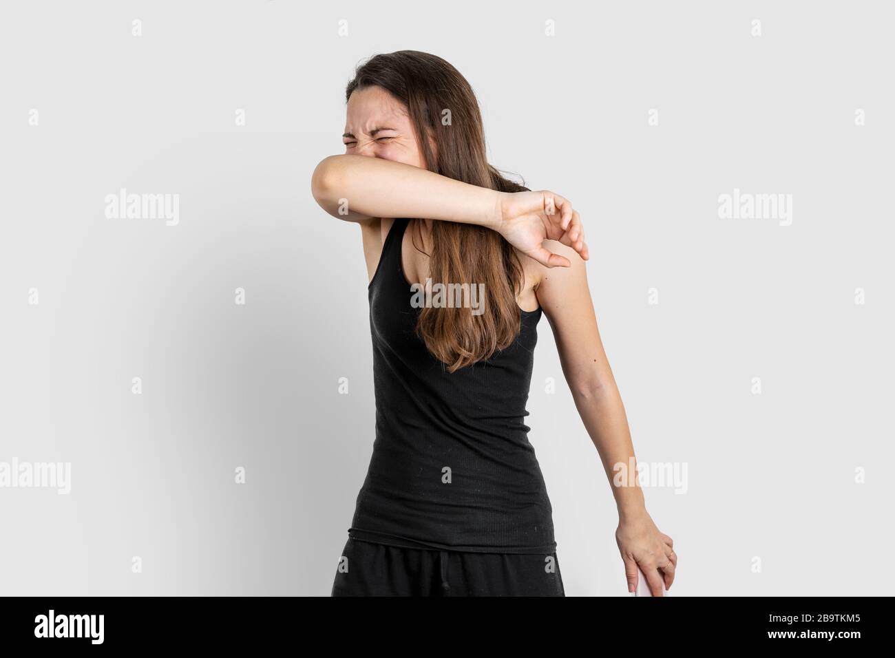 Caucasian woman coughing elbow hi-res stock photography and images - Alamy