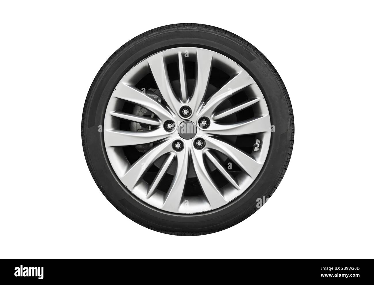 Modern luxury car wheel on a light alloy disc isolated on white background Stock Photo - Alamy