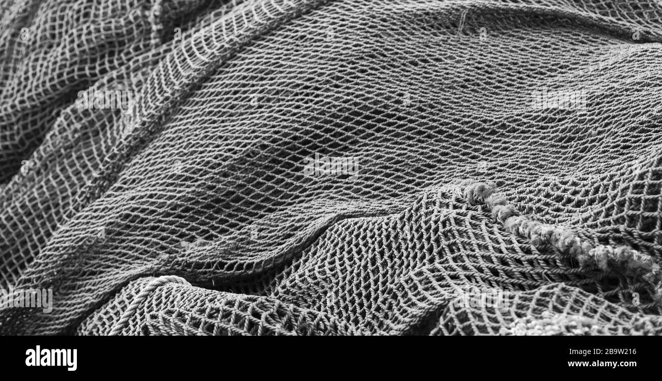 Tools fishnet fisherman Black and White Stock Photos & Images - Alamy