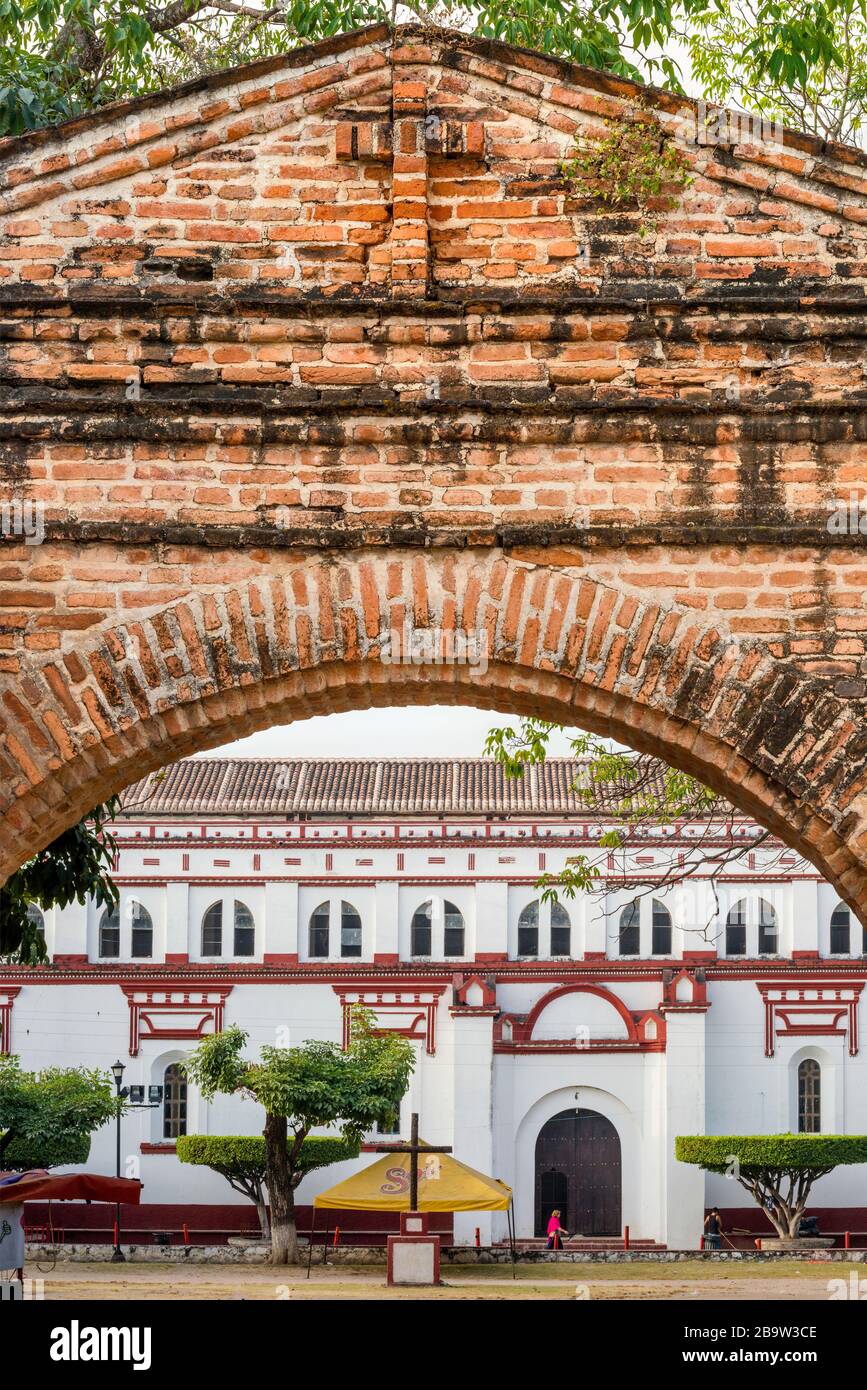 Brick gateway to courtyard at Templo de Santo Domingo de Guzman in ...