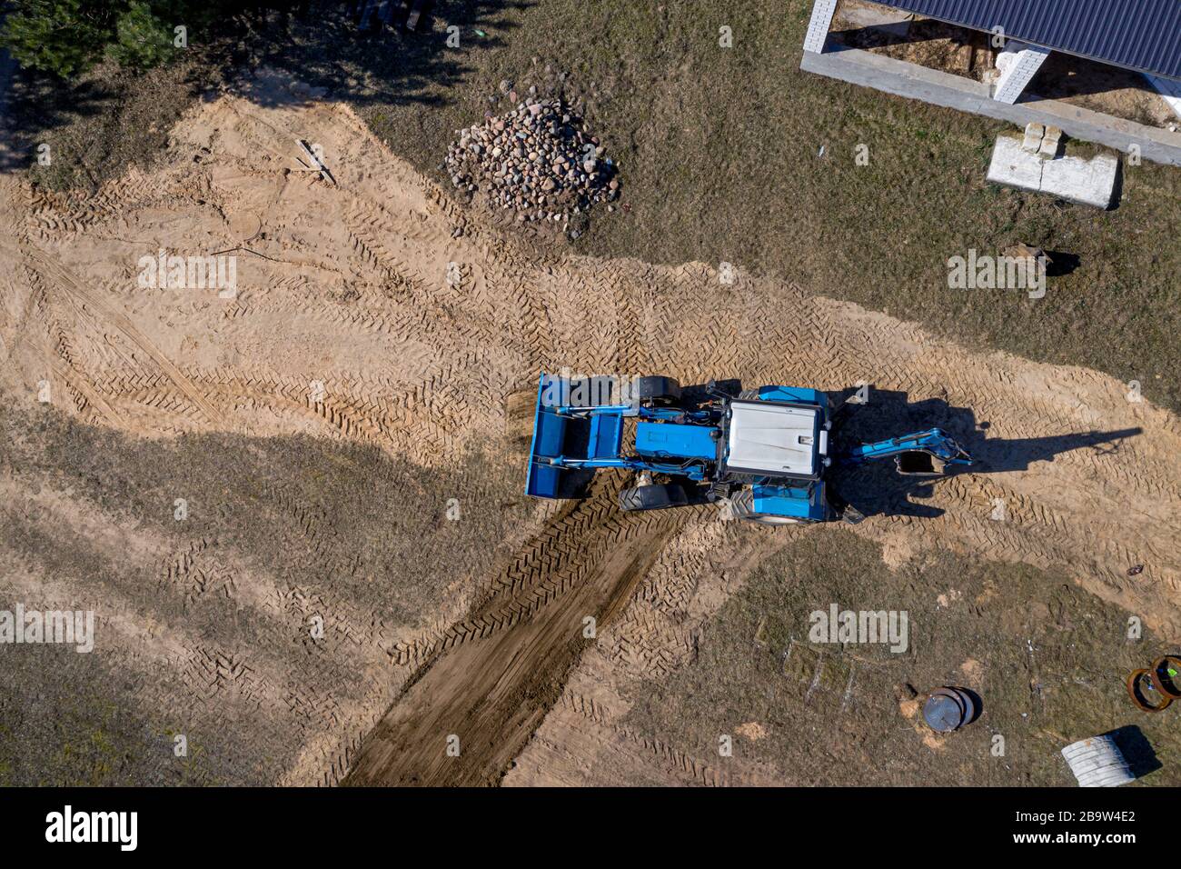 tractor excavator on a construction site top view Stock Photo - Alamy