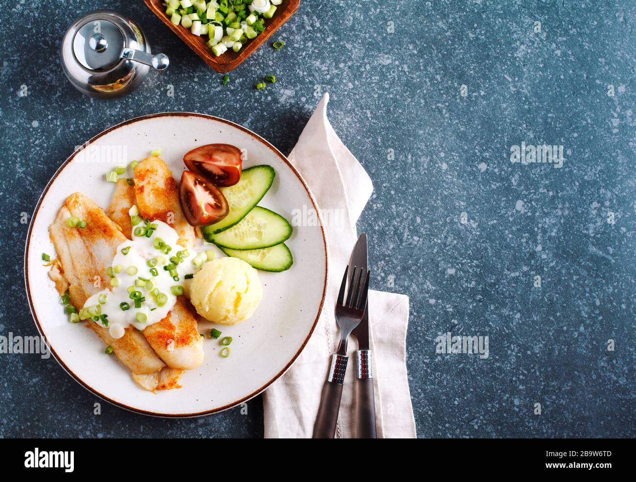 Fried Basa Fillet with sauce, mashed potato and fresh vegetables, copy ...