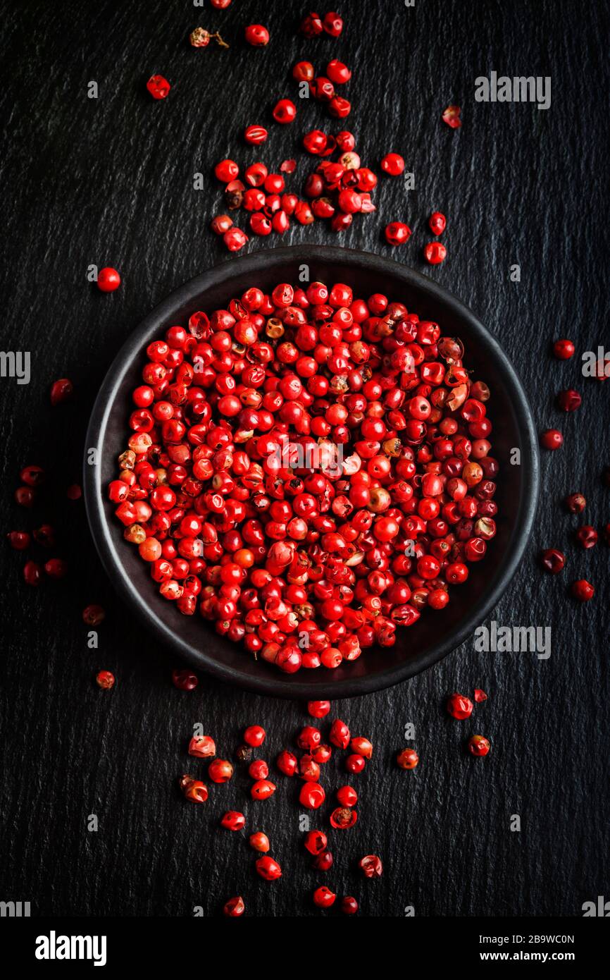 Pink peppercorn in bowl hi-res stock photography and images - Alamy