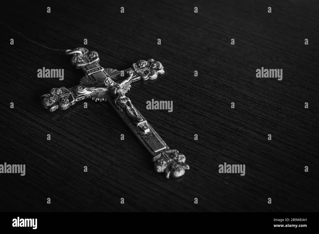 Christ on a wooden cross Black and White Stock Photos & Images - Alamy
