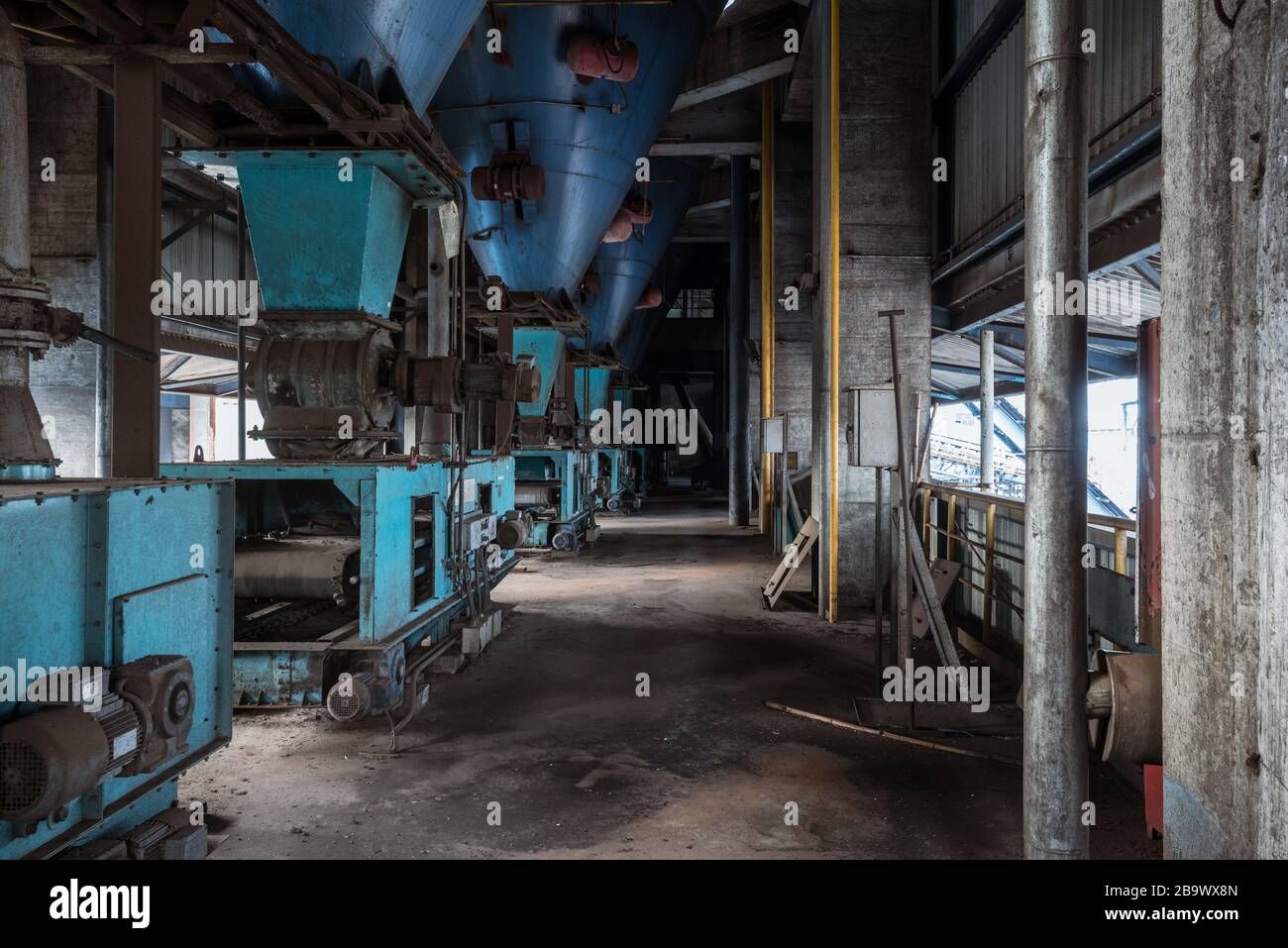 Interior of an old abandoned industrial steel factory Stock Photo - Alamy