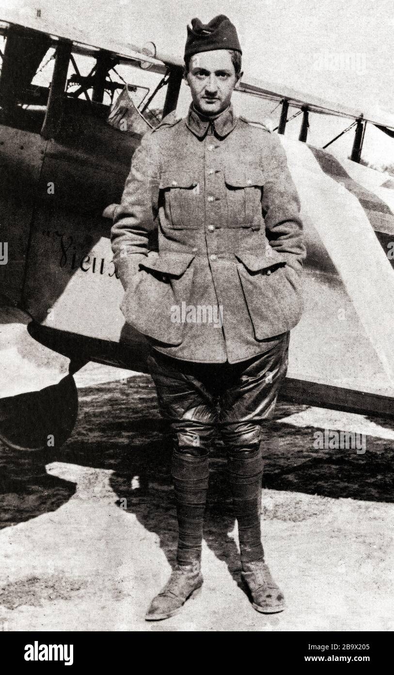 A portrait of Georges Guynemer (1894-1917) in front of his SPAD VII. He ...