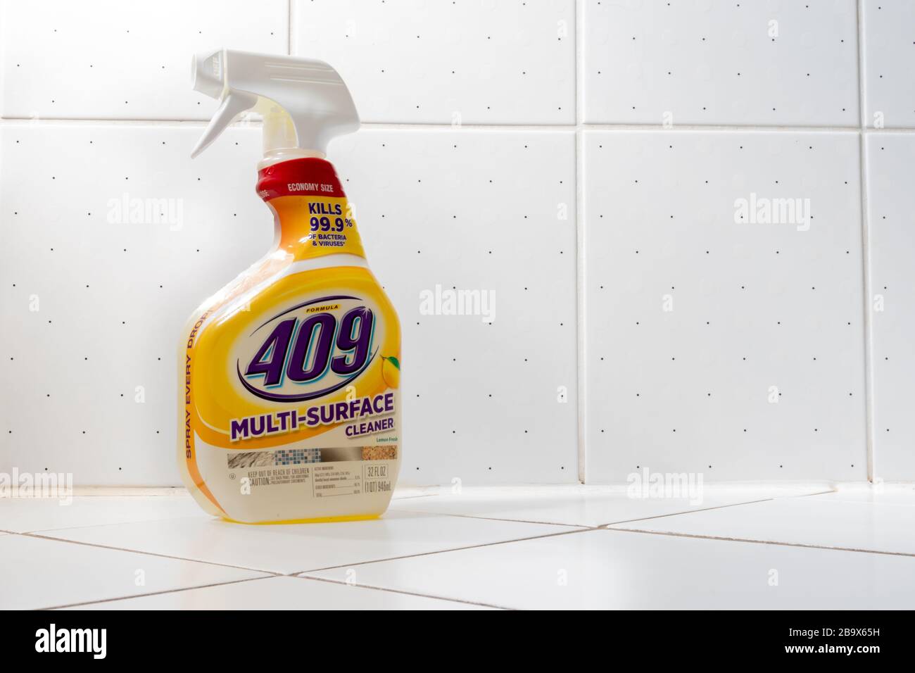 Multi-surface cleaning spray on white tiles Stock Photo - Alamy