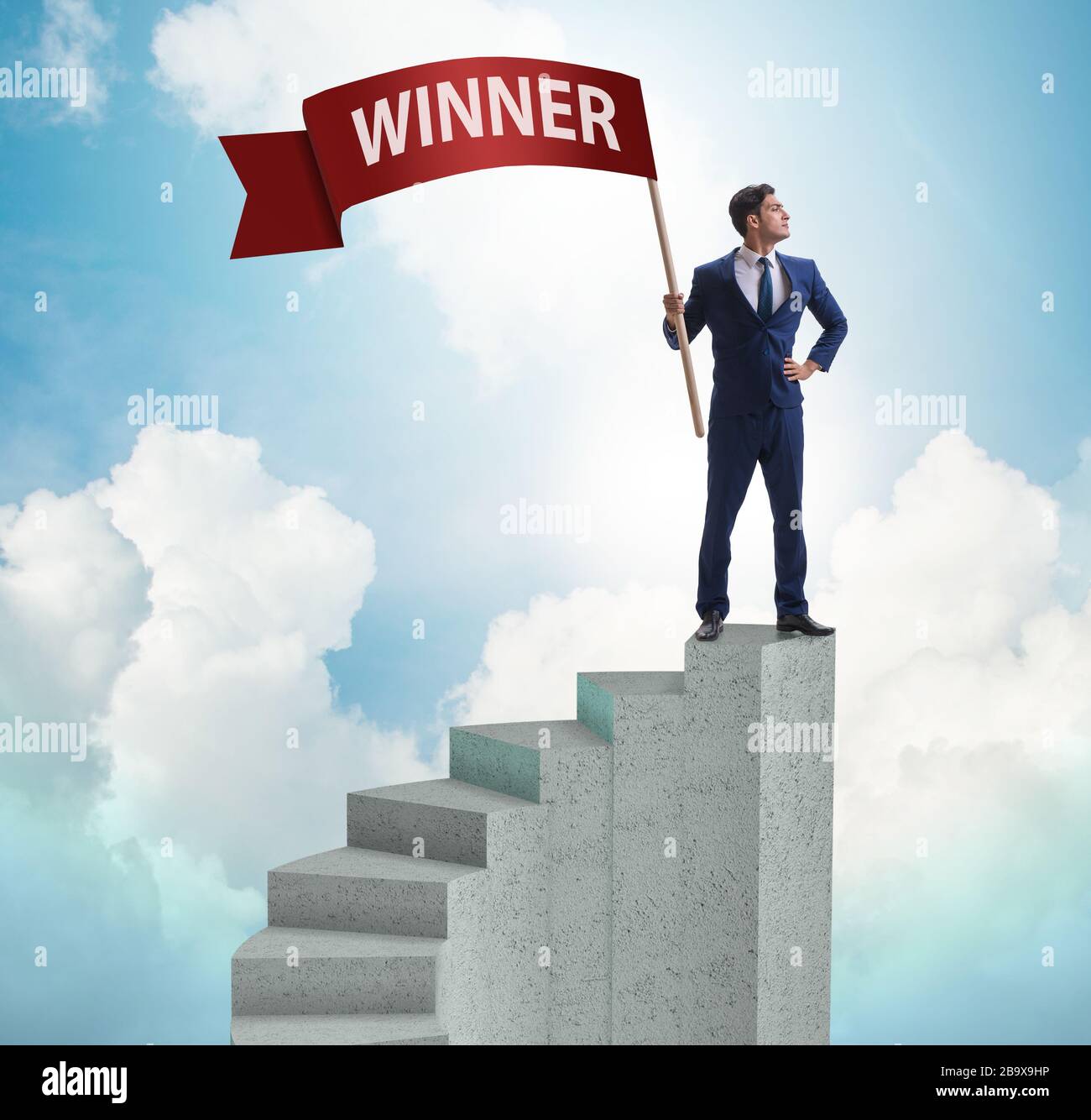 The businessman winner on top of staircase Stock Photo - Alamy
