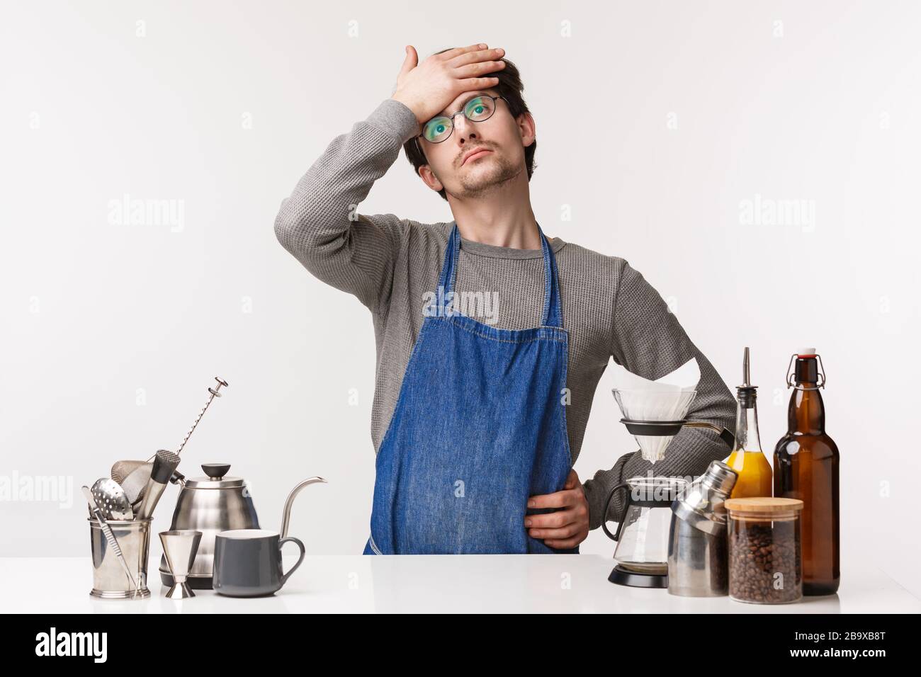 Young tired male barista people hi-res stock photography and images - Alamy