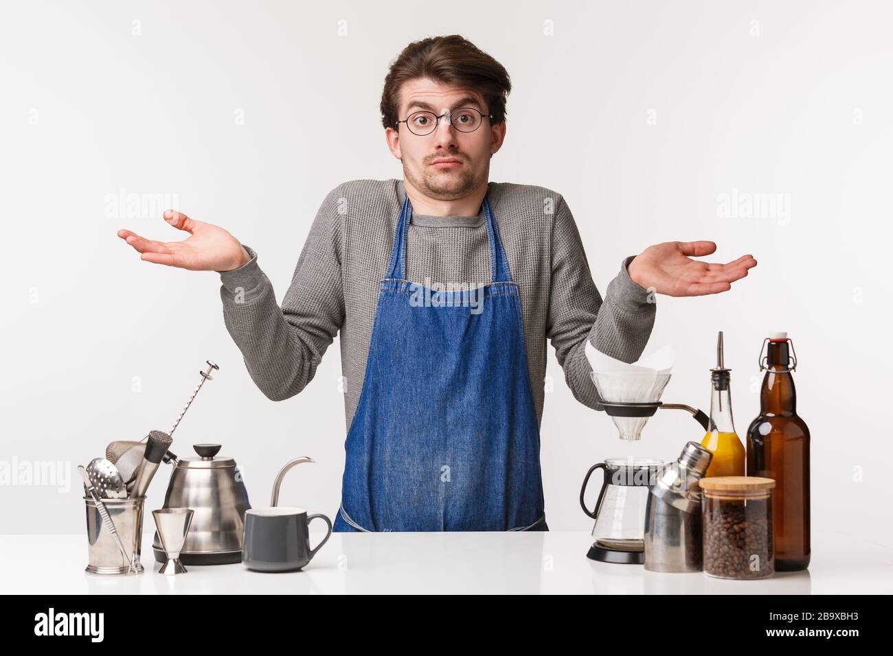 Barista, cafe worker and bartender concept. Portrait of confused and ...