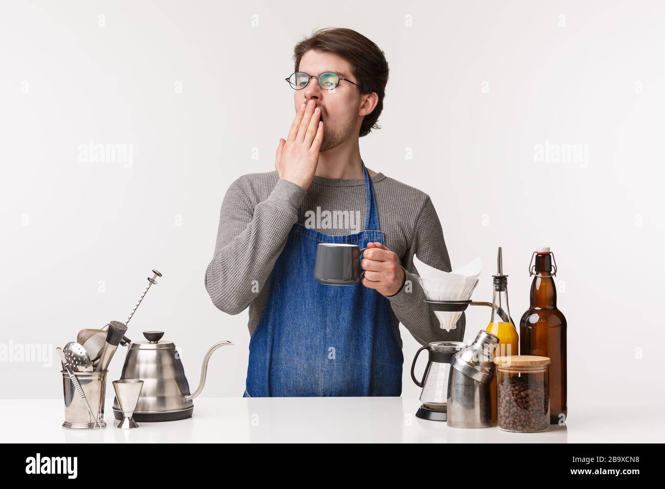 Young tired male barista people hi-res stock photography and images - Alamy