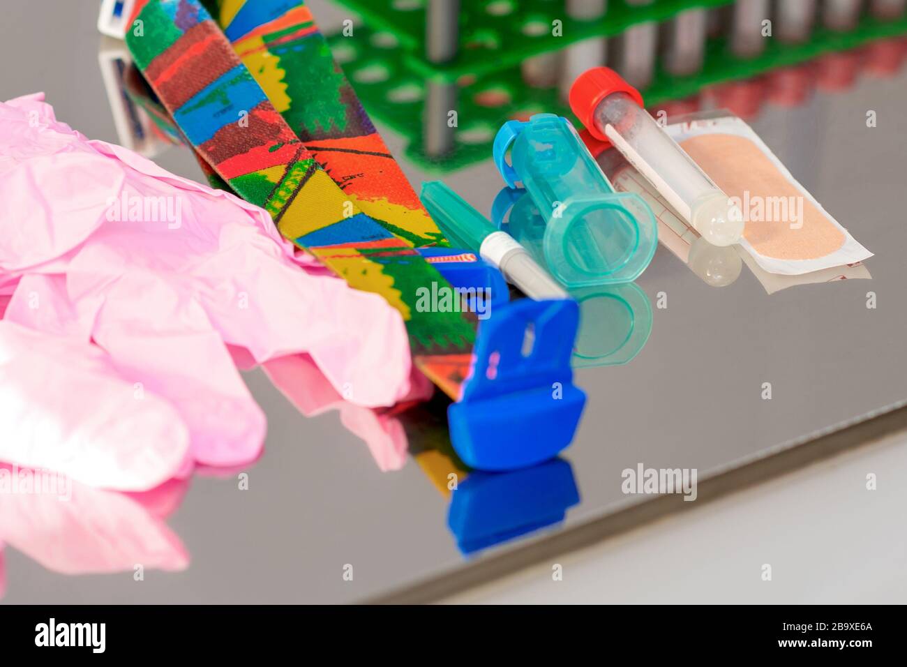 Syringe and empty test tubes on rack for experiment blood samples Stock ...