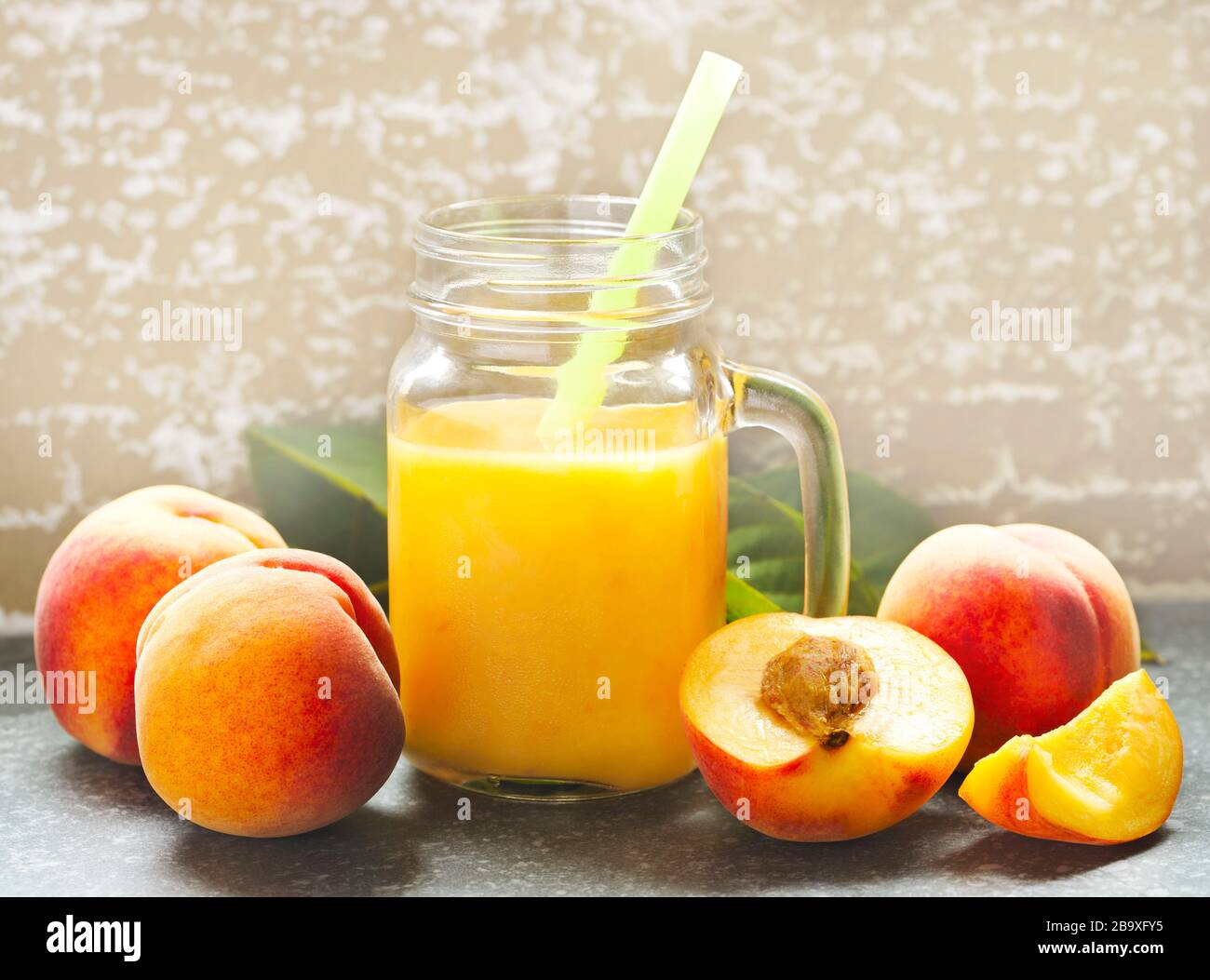 Peach juice in glass hi-res stock photography and images - Alamy