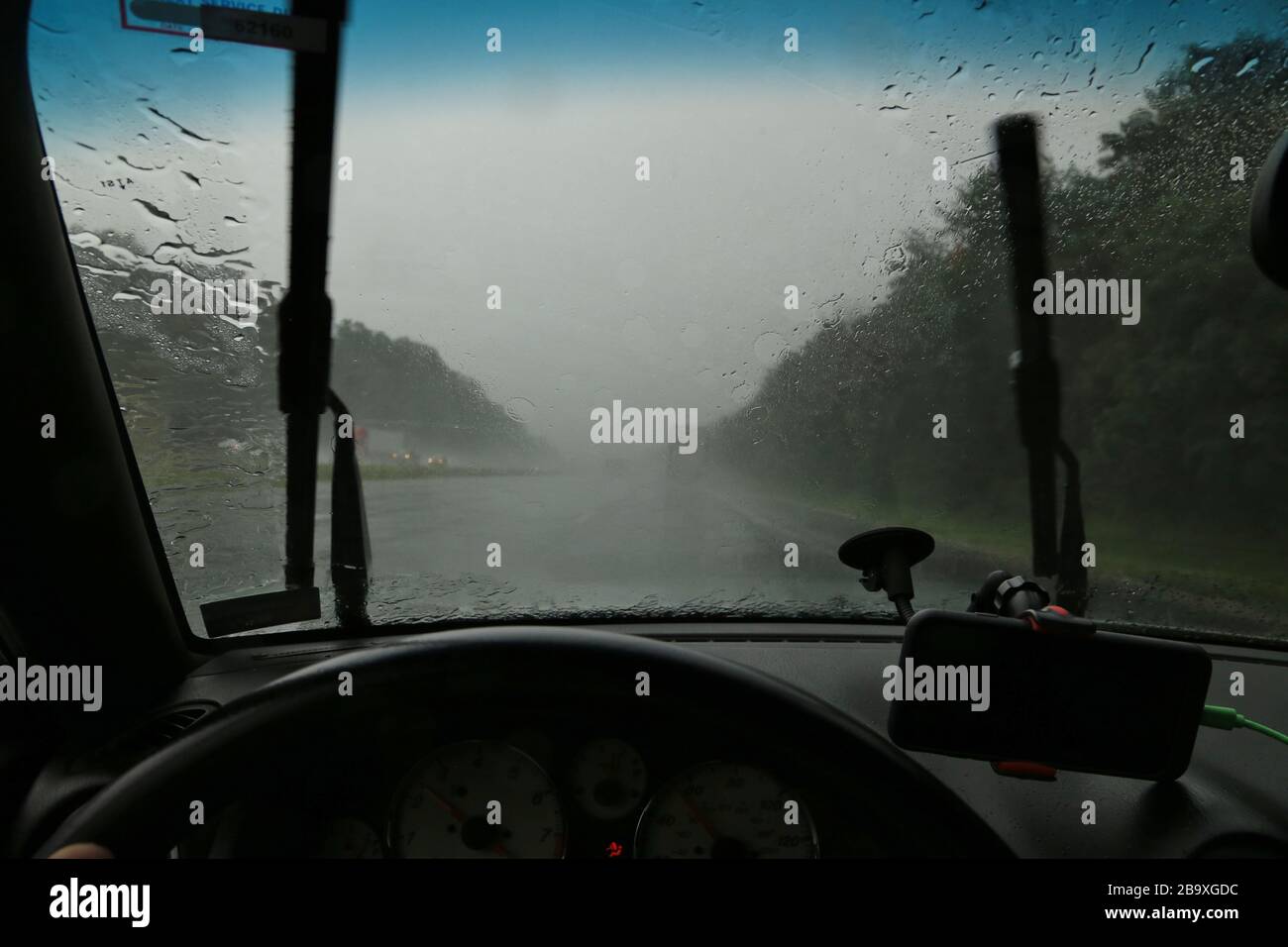 Driving into storm driver view hi-res stock photography and images - Alamy