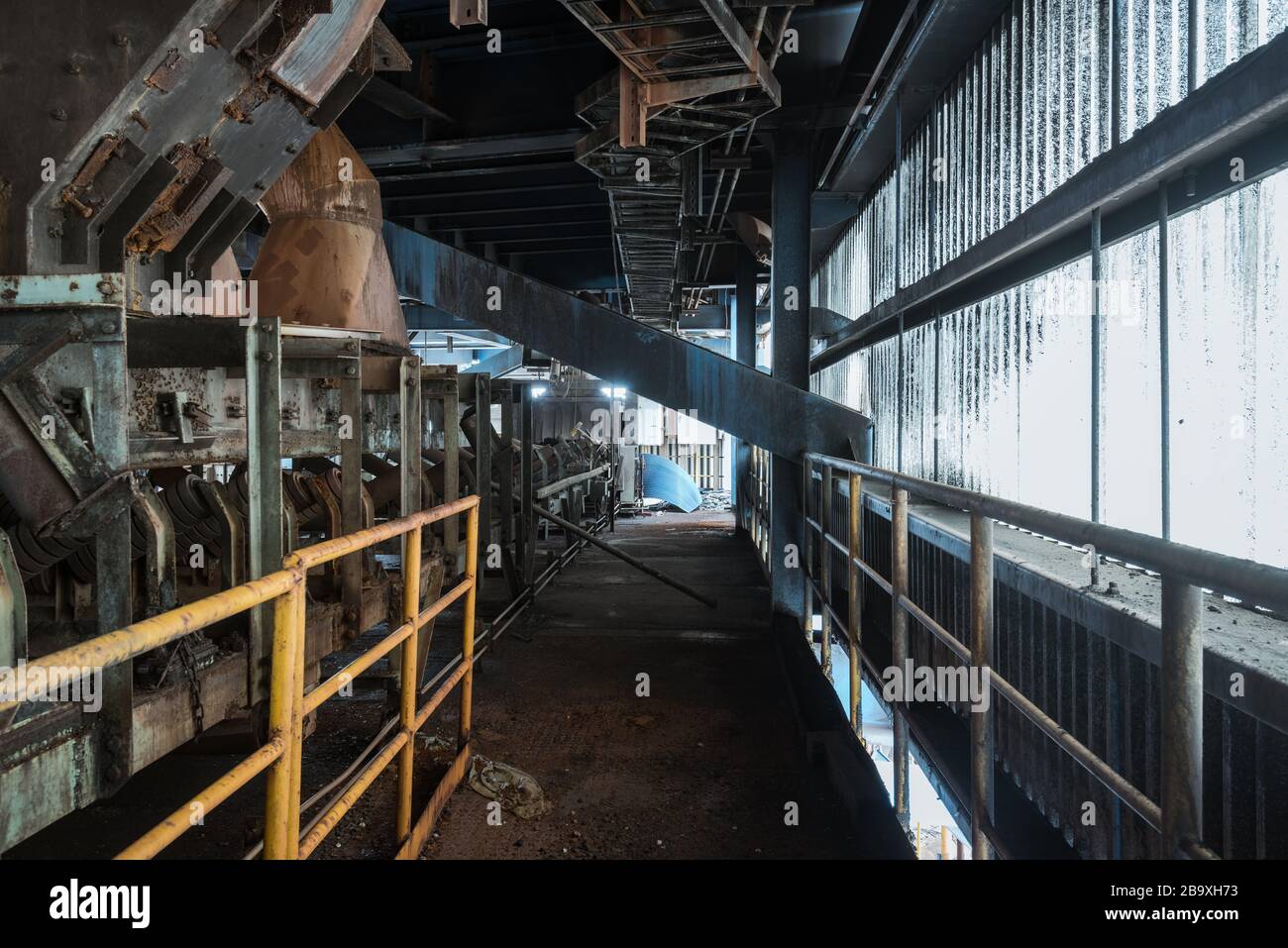 Interior of an old abandoned industrial steel factory Stock Photo - Alamy