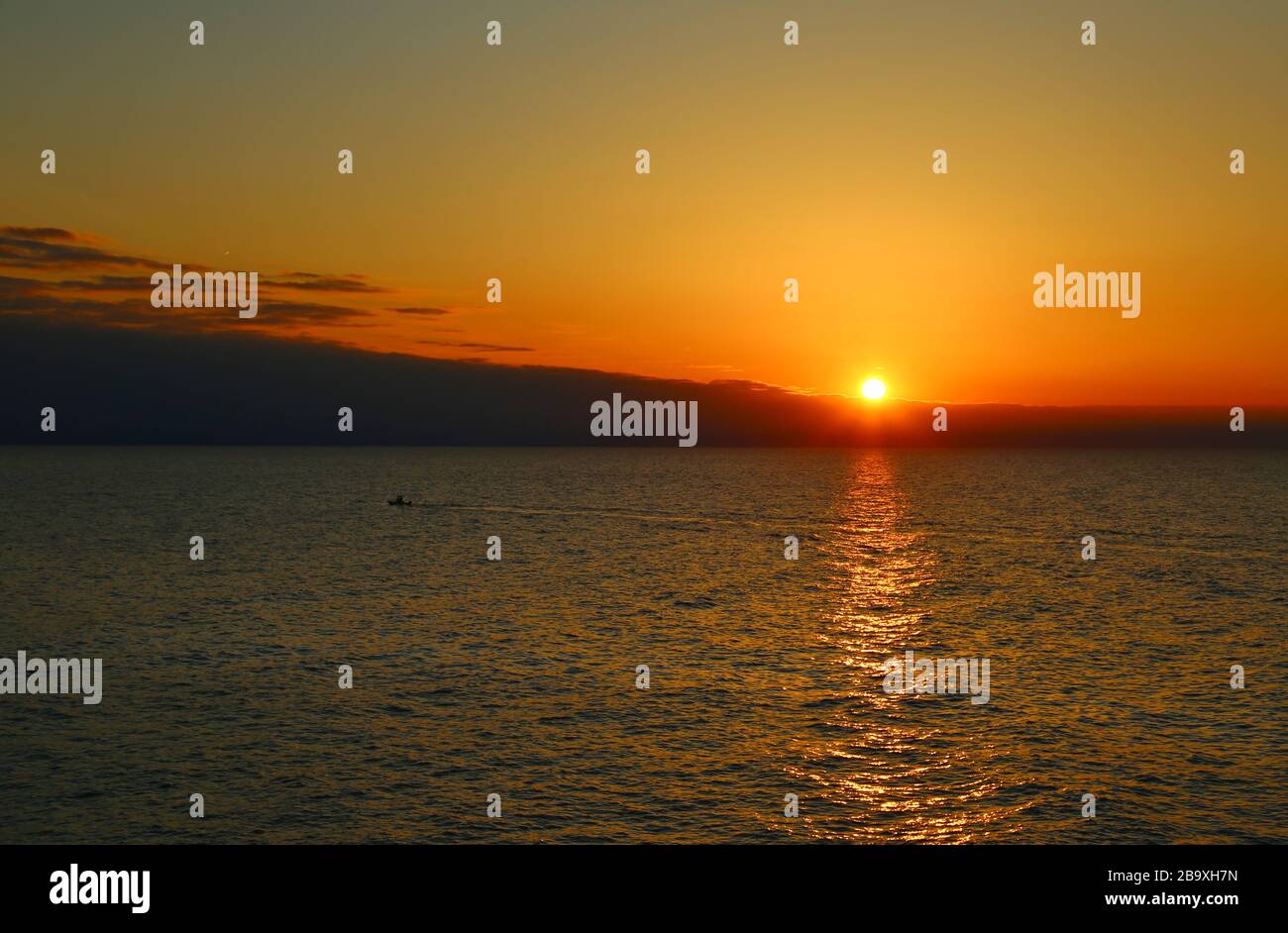 Amber colored sunset sky Stock Photo - Alamy