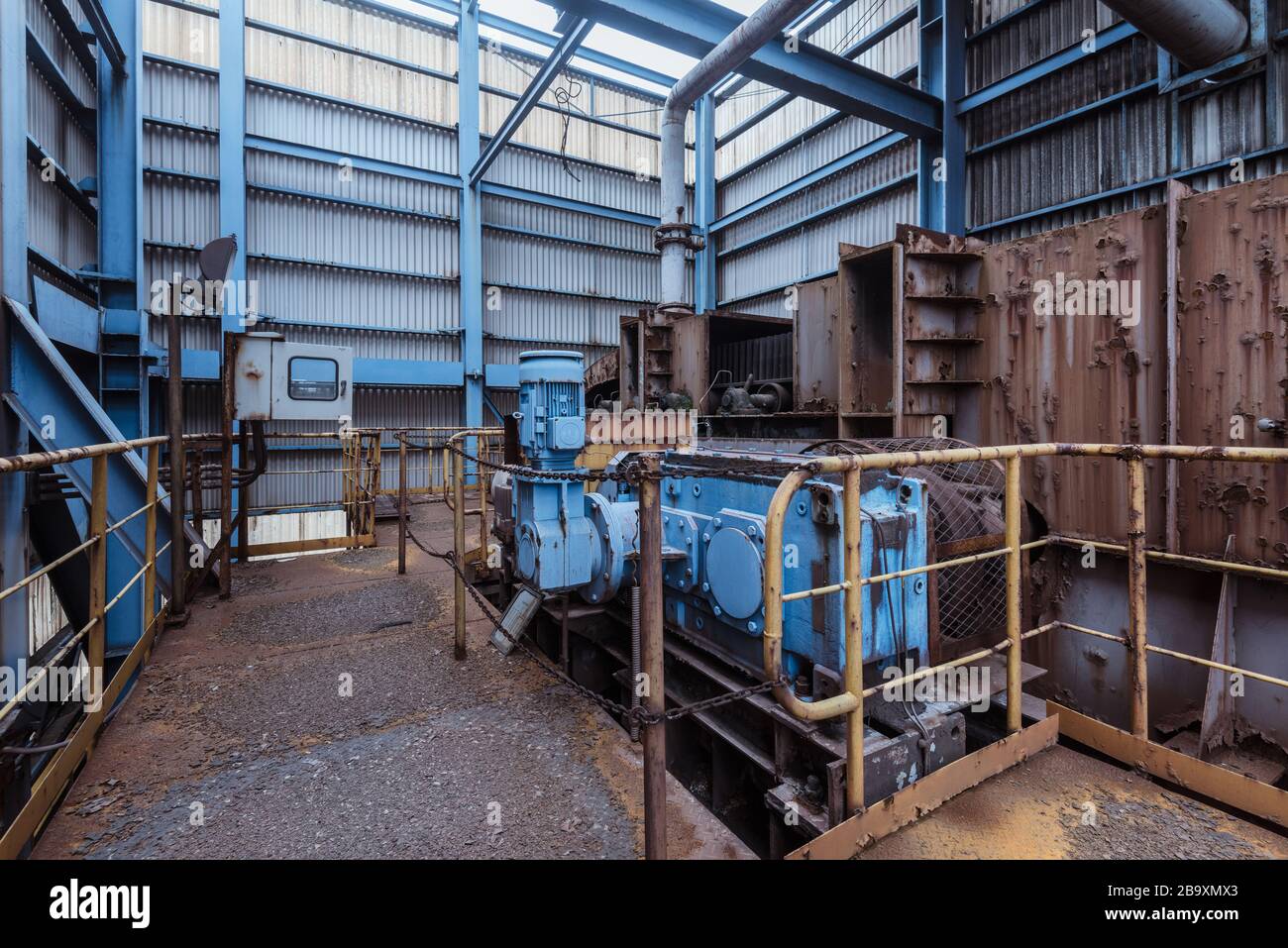 Interior of an old abandoned industrial steel factory Stock Photo - Alamy