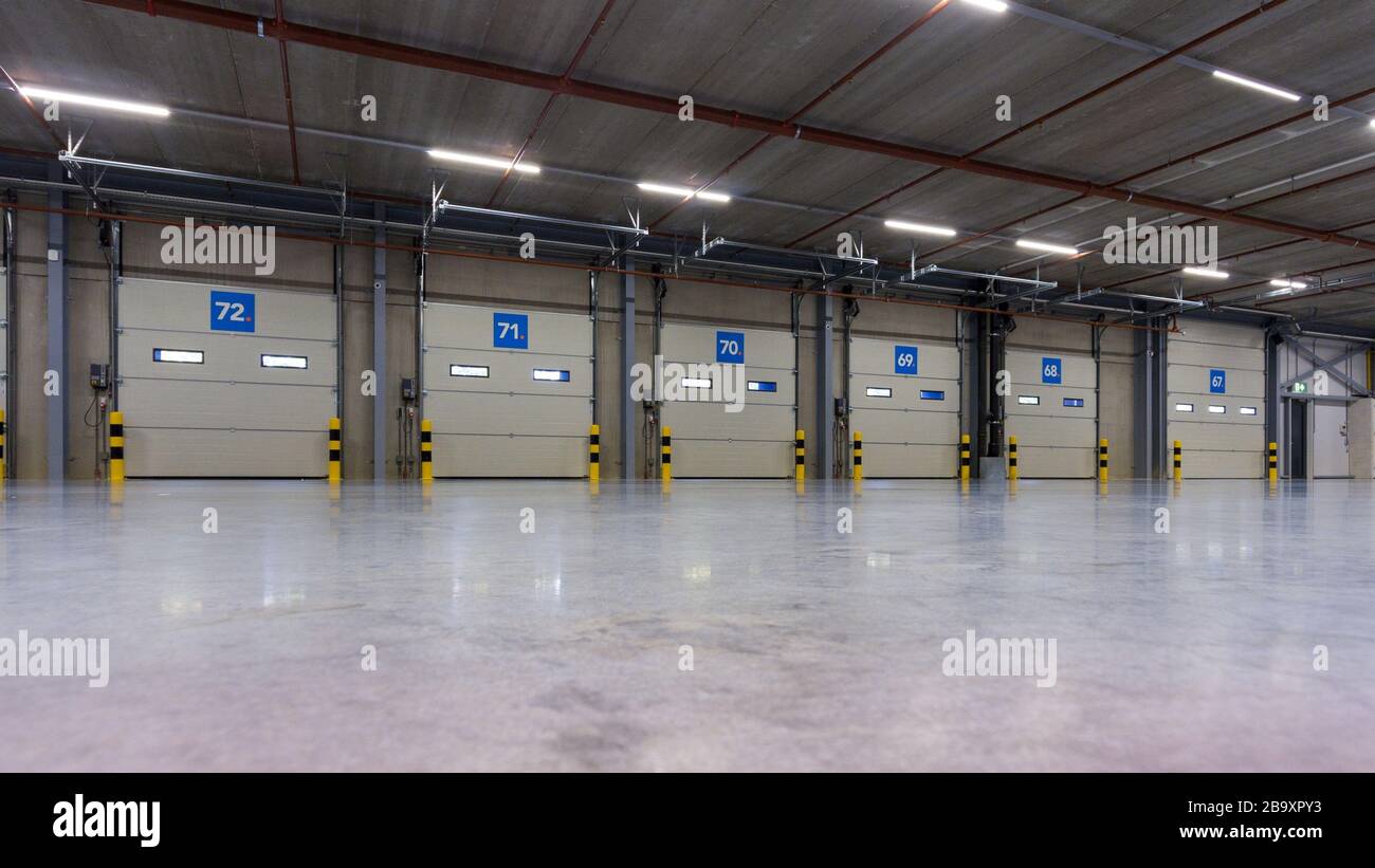 Numbered loading docks at a warehouse Stock Photo - Alamy