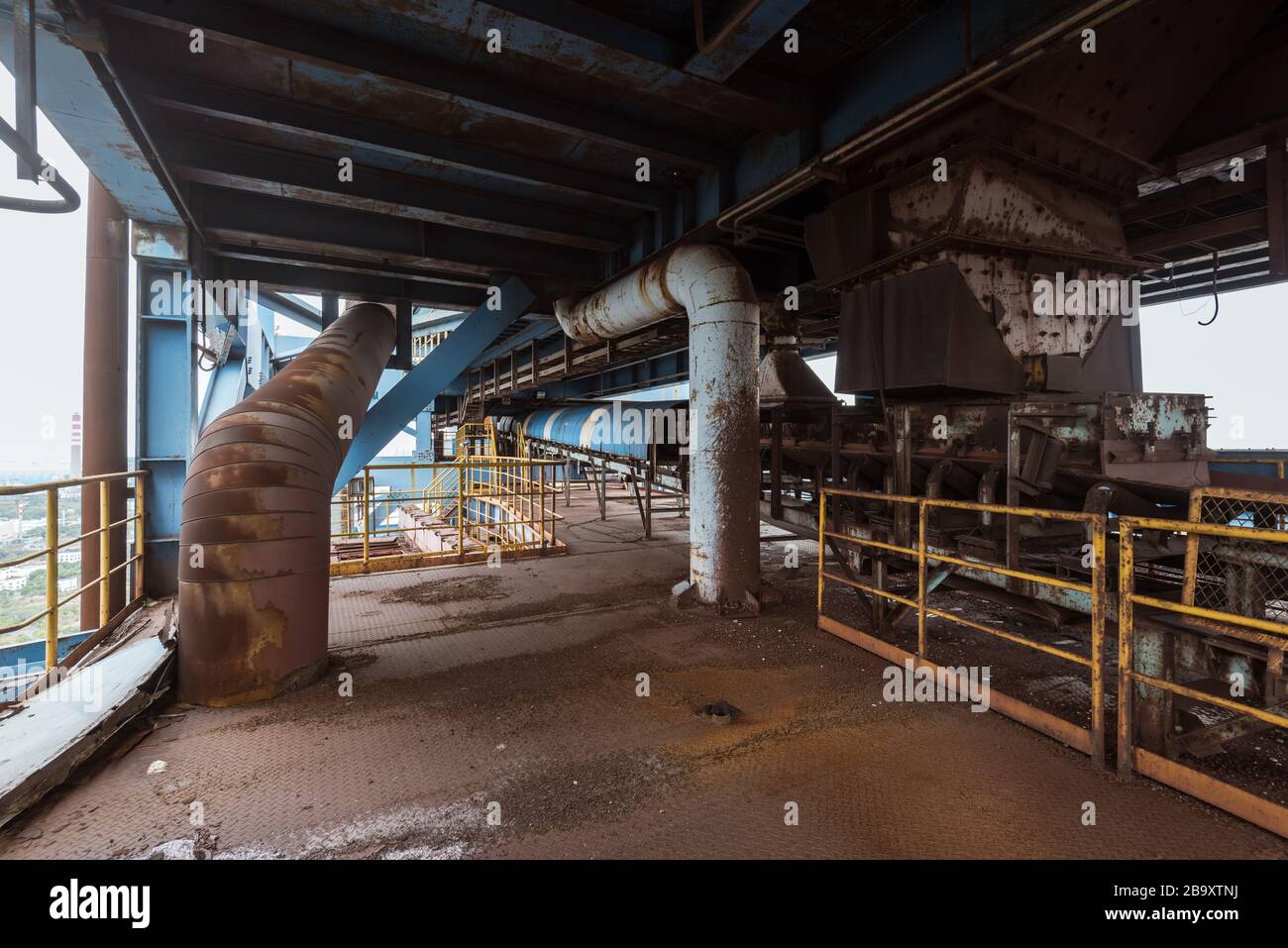 Interior of an old abandoned industrial steel factory Stock Photo - Alamy
