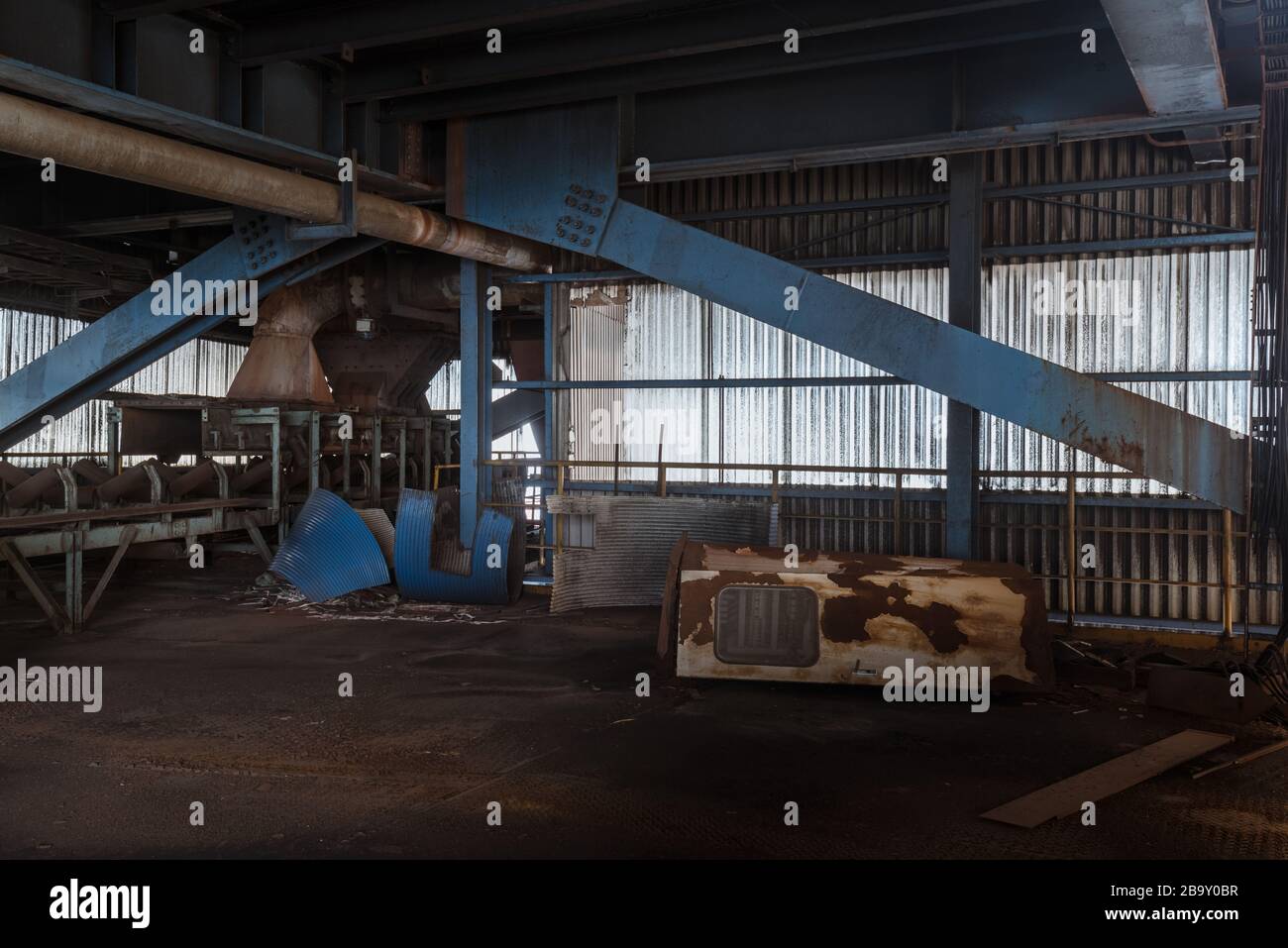 Interior of an old abandoned industrial steel factory Stock Photo - Alamy