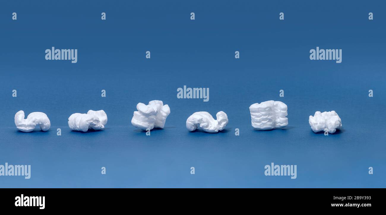 Polystyrene or white styrofoam packing pieces used for minimize bumps ...