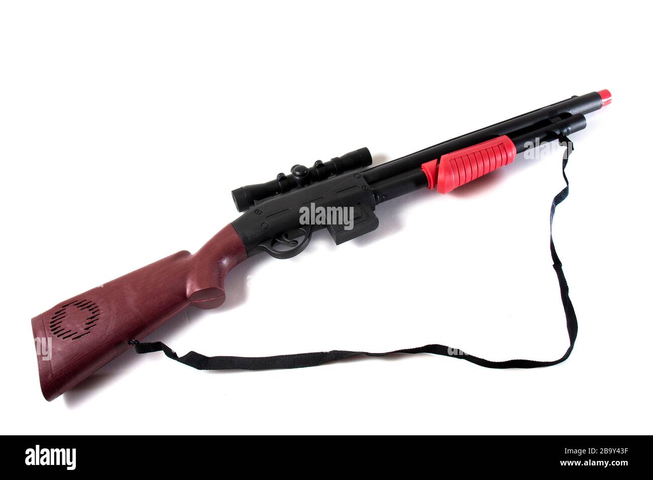 plastic shotgun toy isolated on a white background Stock Photo - Alamy