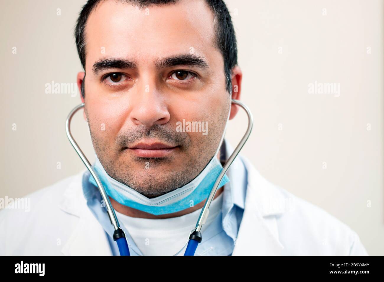 caucasian doctor with stethoscope portrait on a white background Stock ...